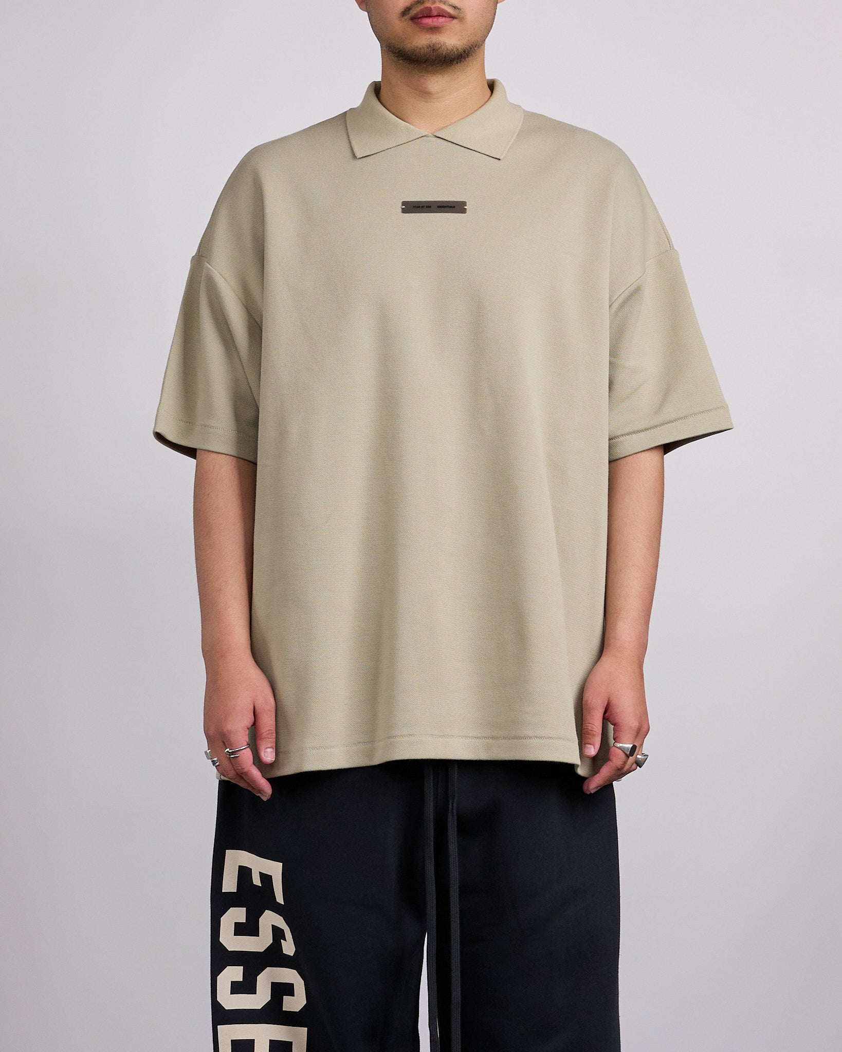 Fear of God Essentials 90's Fit Pique Polo Shirt Abbey Stone – LESS 17